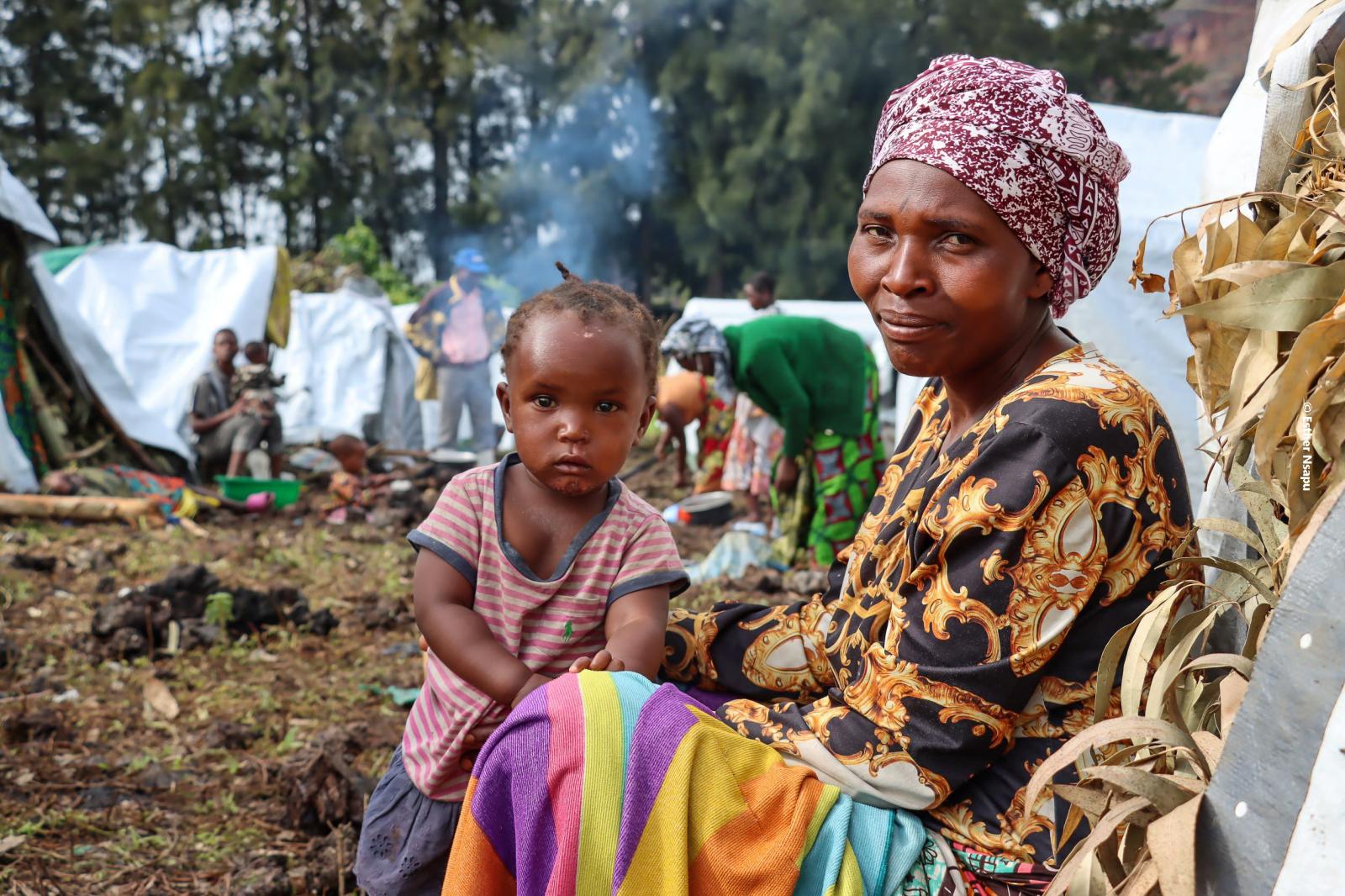 It is not easy to bring a smile to the faces of these war-displaced ...